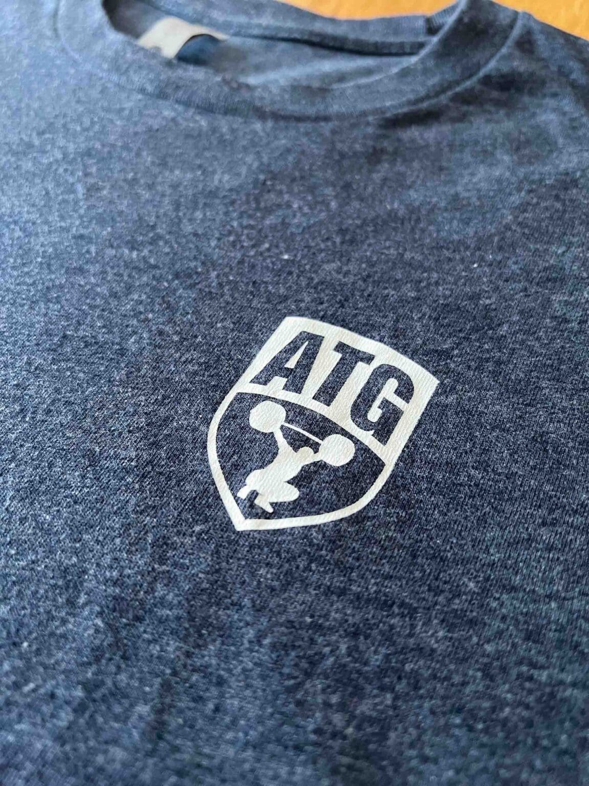 ATG Midnight Navy/White Shield Pocket Logo Tee – hookgrip store
